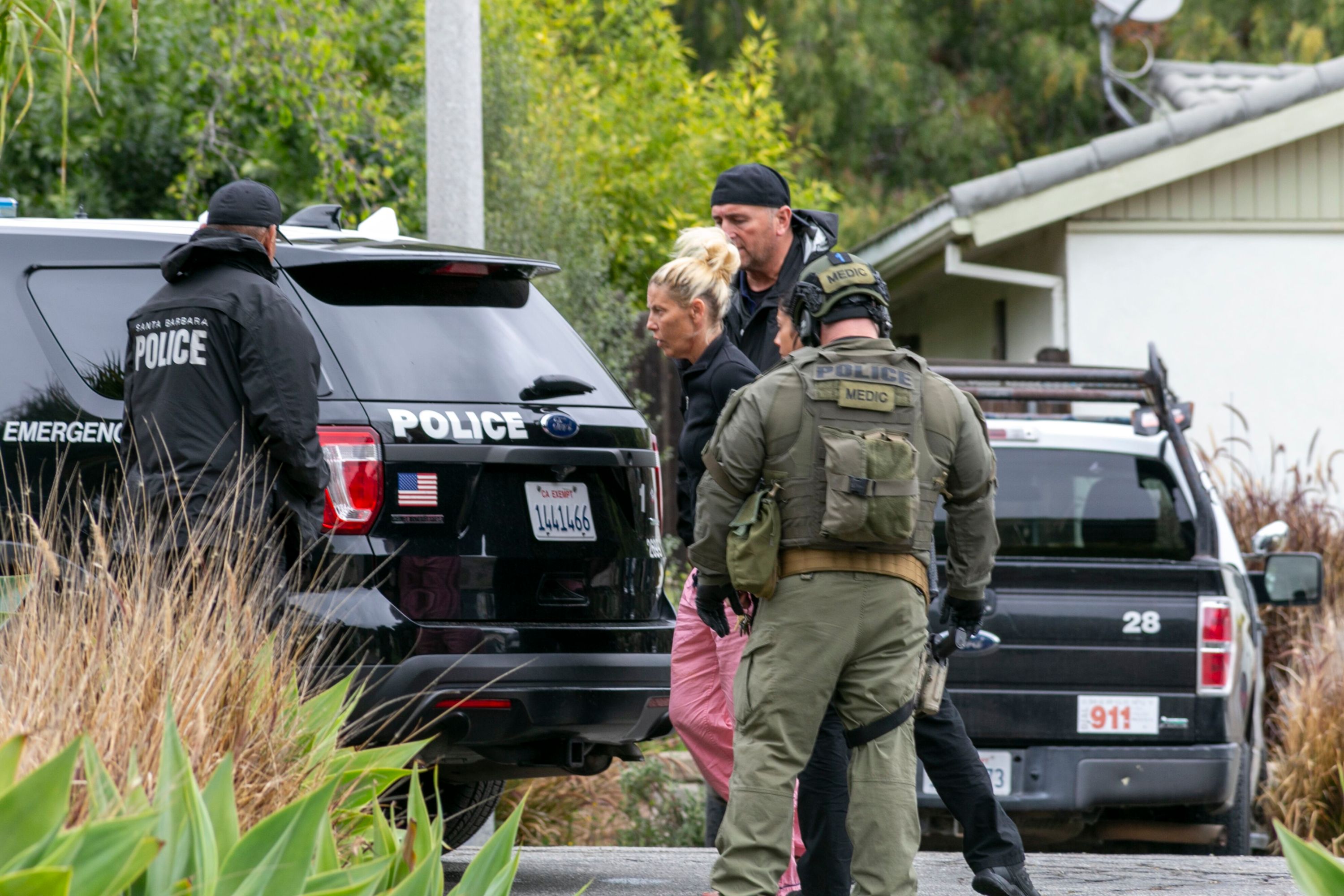Woman Hides in Car After Accused of Assault on Two Civilians, One ...