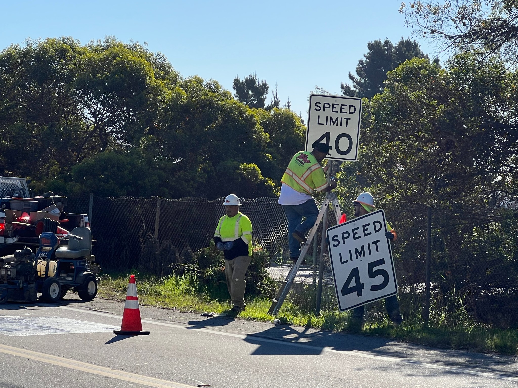New Lowered Speed Limit Signs with Flags Going Up at Designated ...