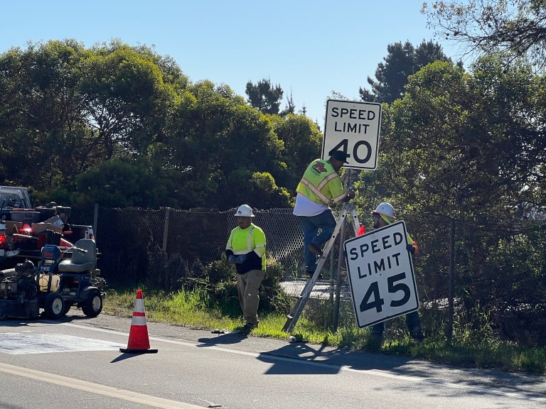New Lowered Speed Limit Signs with Flags Going Up at Designated ...