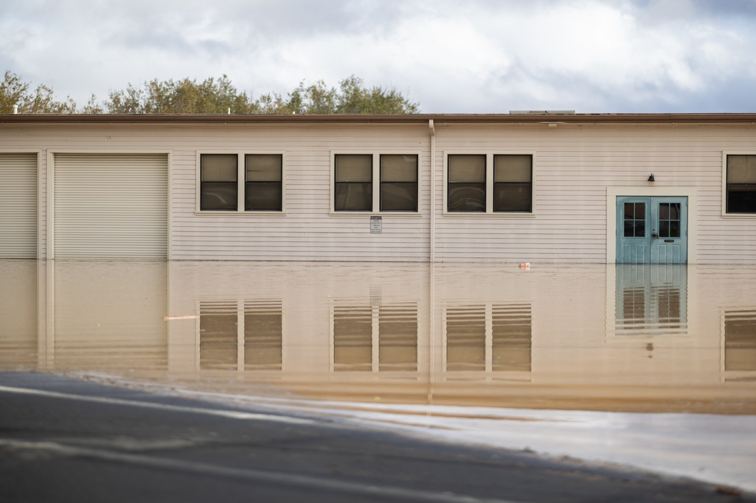Weekend Storm Delivers Inches of Rain, Road Closures, Airport Shutdown ...